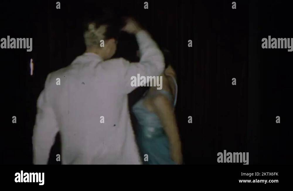 1965: couple dancing beautiful wearing gown coat white amazing Stock ...