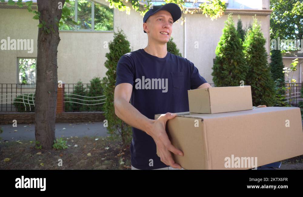 Delivery man big parcel on Stock Videos & Footage - HD and 4K Video ...