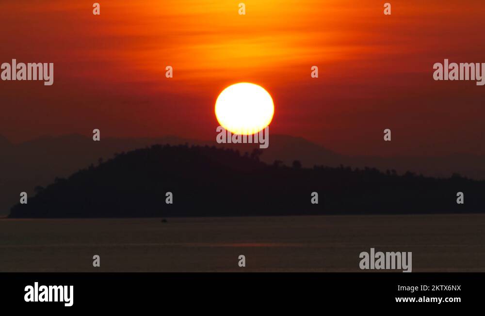 Sunset behind island Stock Videos & Footage - HD and 4K Video Clips - Alamy