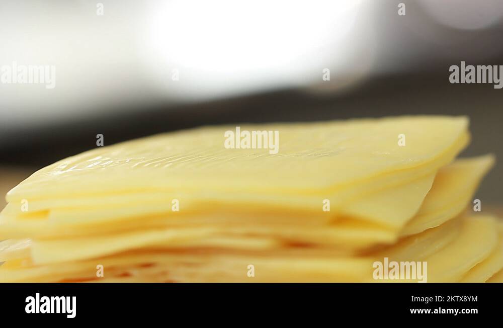 Cheddar slice cheese Stock Videos & Footage - HD and 4K Video Clips - Alamy