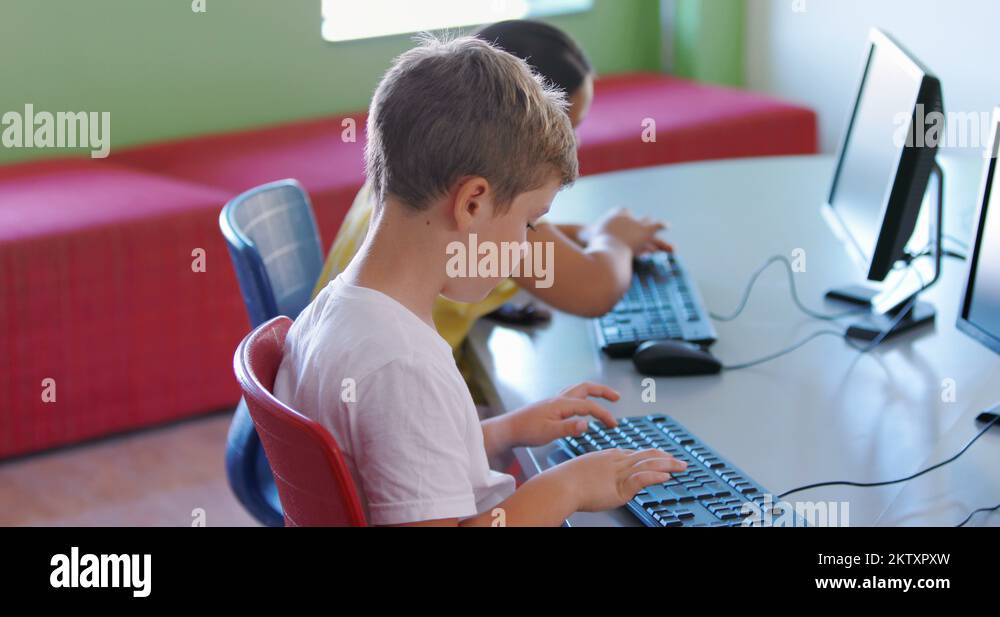 School kids using computer in classroom Stock Videos & Footage - HD and ...