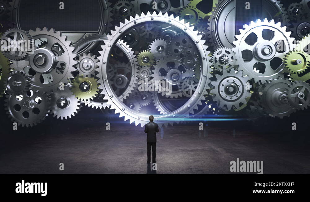 Businessman standing big Gear wheels, connecting gear wheels.1 Stock ...