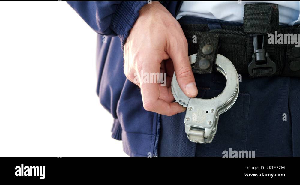 Holding handcuffs Stock Videos & Footage - HD and 4K Video Clips - Alamy