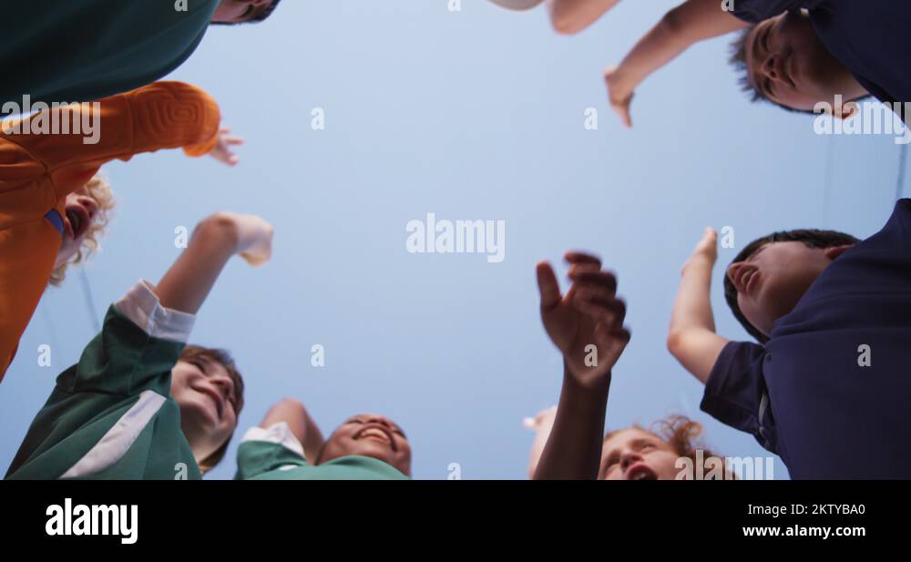 Boy's youth soccer team huddle and stack hands Stock Video Footage - Alamy