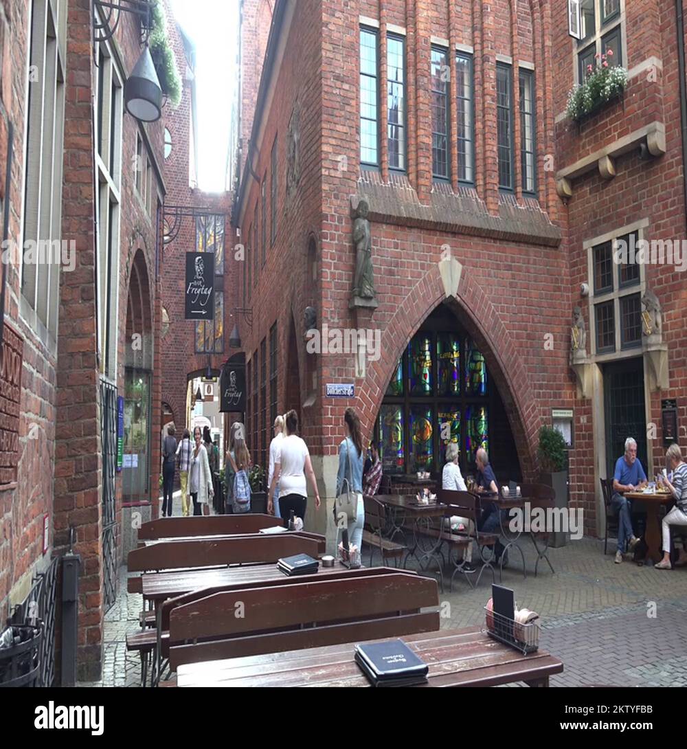 4k Bremen city panning shot famous alley Böttchertrasse with red brick ...