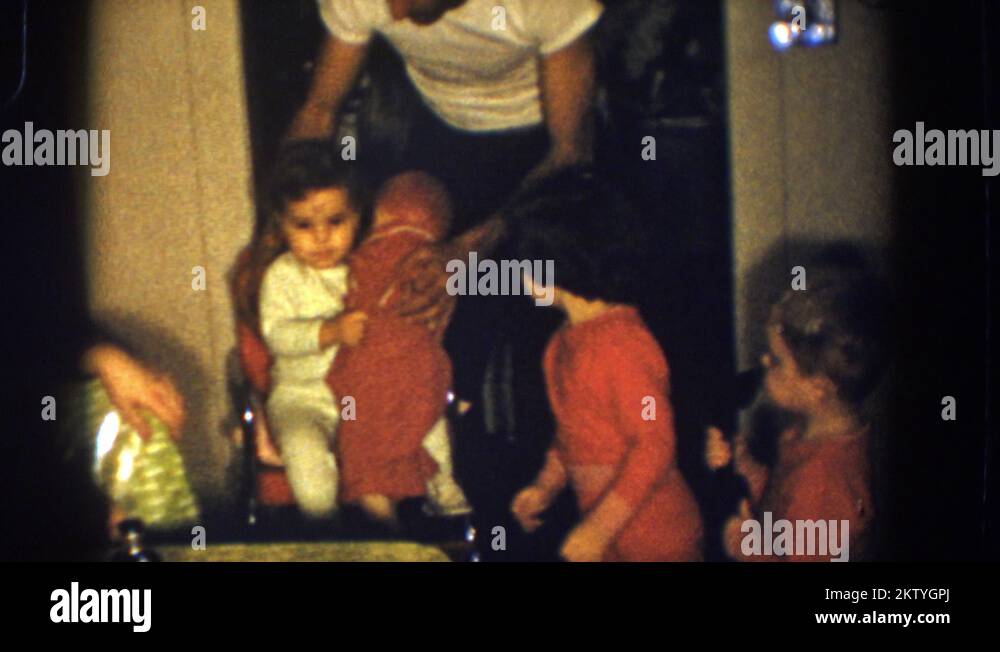 1958: children playing with baby doll ALIQUIPPA, PENNSYLVANIA Stock ...