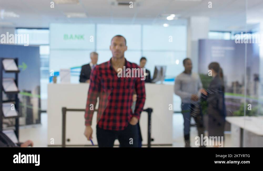 4K View behind screen of customer in modern bank using interactive atm ...