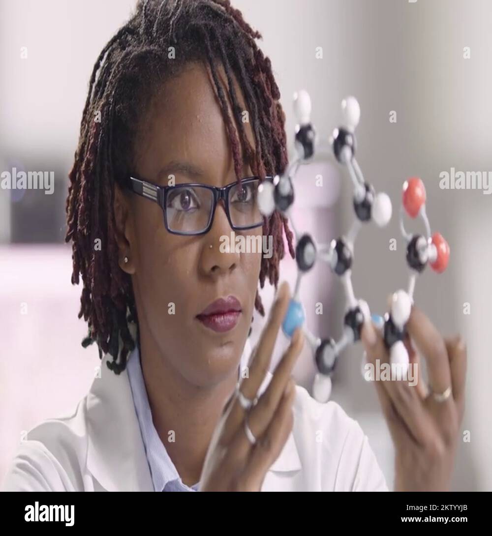 Female scientist looking at molecule model Stock Videos & Footage - HD ...