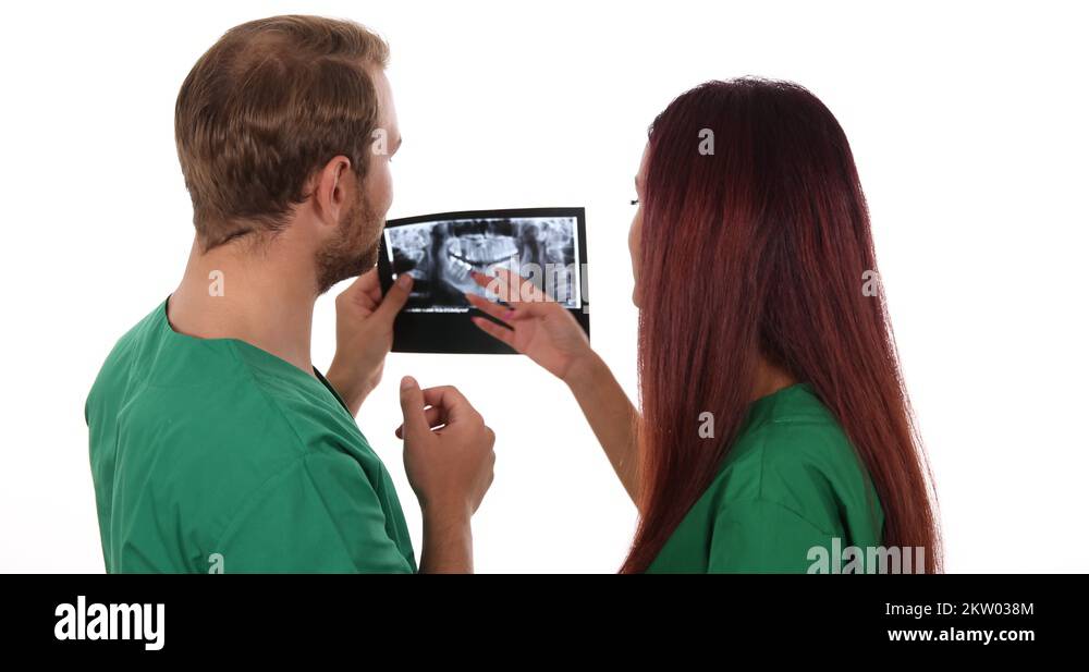 Teamwork Friendly Dentists Analyze Radiography Looking Diagnostic ...