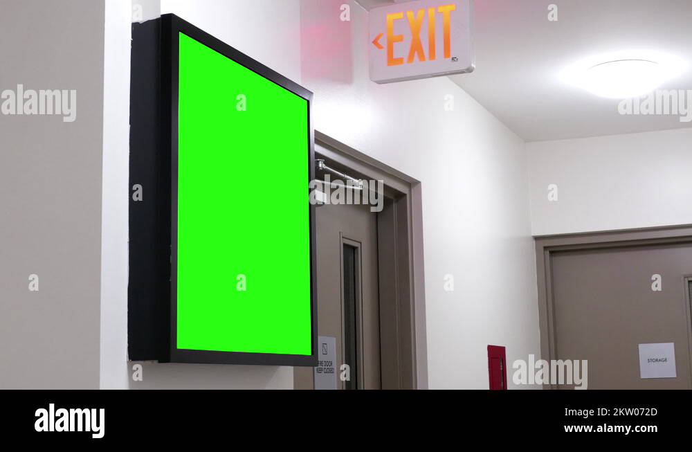 Green billboard for your ad beside exit sign for stairway with 4k ...