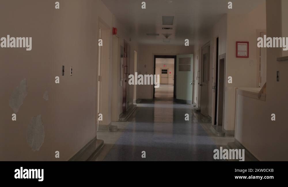 Dutch Angle Walk through abandoned hospital hallway Stock Video Footage ...