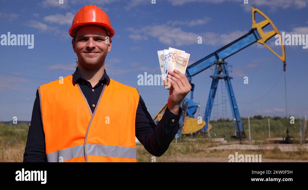 Optimistic Oil Pump Worker Man Showing Money Euro Bills Smiling Looking ...
