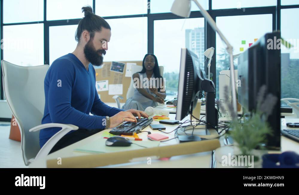 4K Businessman with bicycle leaving work & saying goodbye to colleagues ...
