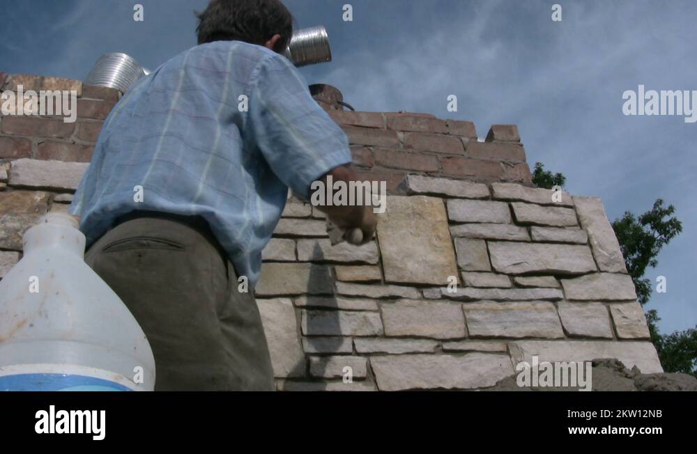 Laying stones Stock Videos & Footage - HD and 4K Video Clips - Alamy