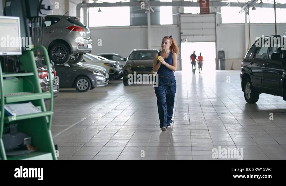 Woman check up car Stock Videos & Footage - HD and 4K Video Clips - Alamy