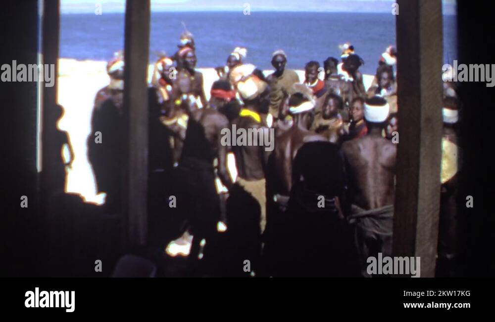 1969: tribal dance in formal wear in a circle with their children ...