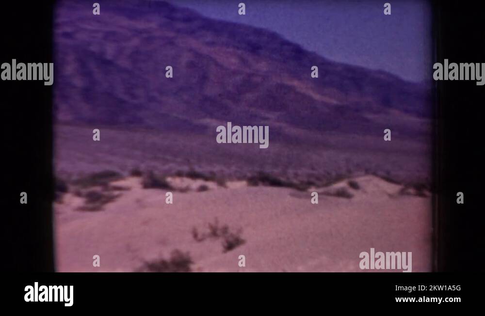 1958: a large mountain range in the desert with small bushes ARIZONA ...