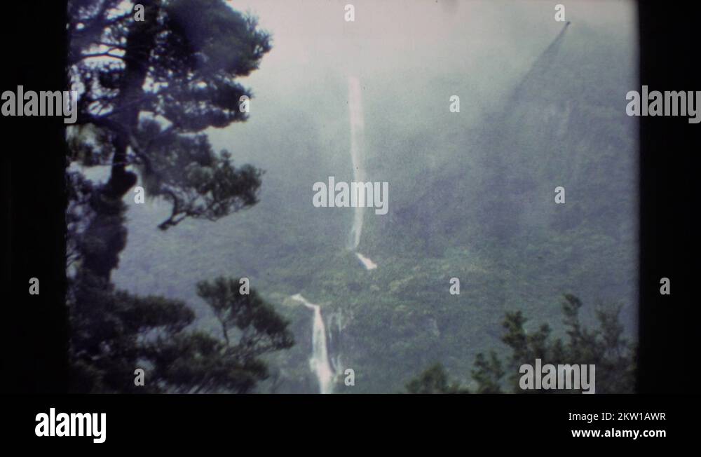 1982: very tall waterfalls in the background of a lush forest NEW ...