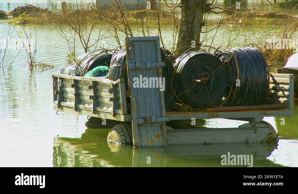Tractor trailer in the water. Consequences of flooding in urban area ...