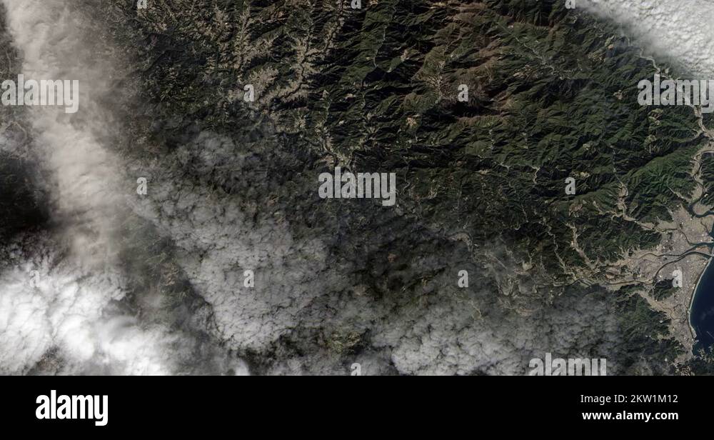 High-altitude overflight aerial of Mount Aso, Japan's Kyushu island ...