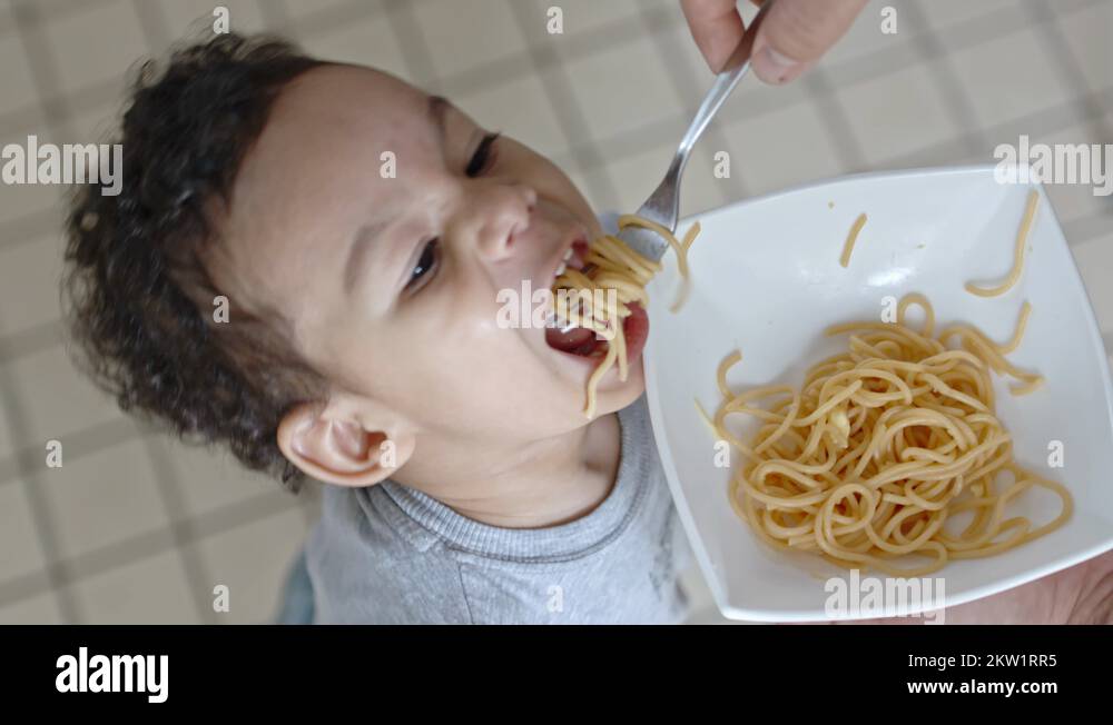 Kid pasta Stock Videos & Footage - HD and 4K Video Clips - Alamy