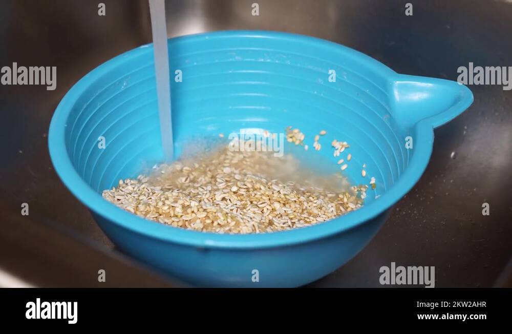 Washing rice Stock Videos & Footage - HD and 4K Video Clips - Alamy