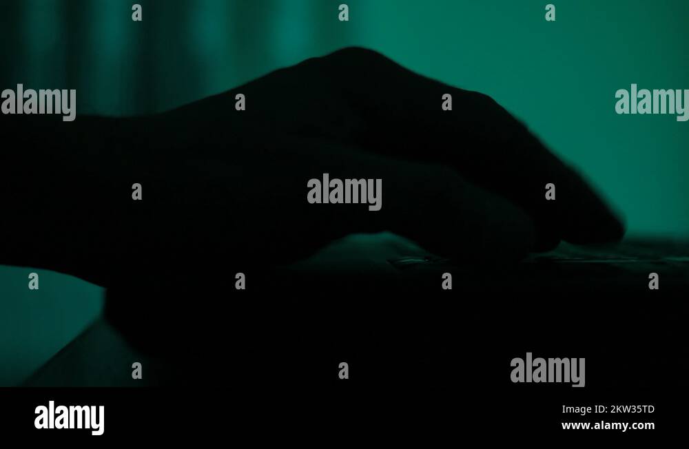 Nervous male hand typing on the keyboard in the darkness Stock Video ...