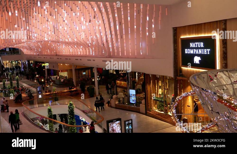 Tilt down people walking shopping inside mall of Scandinavia shopping ...