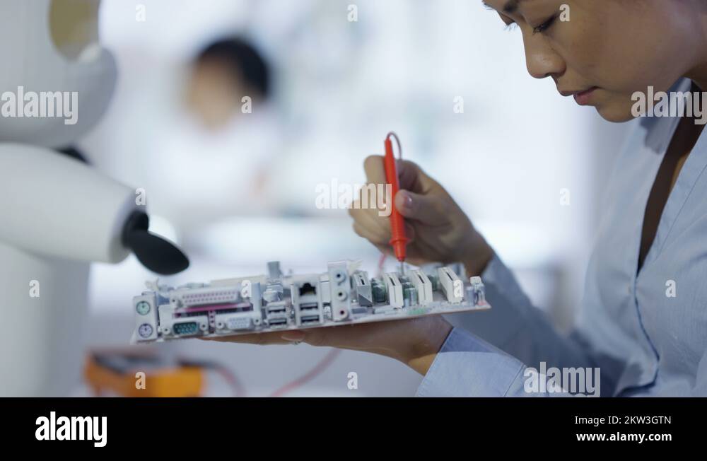 4K Technical design team collaborating on construction of robot in ...