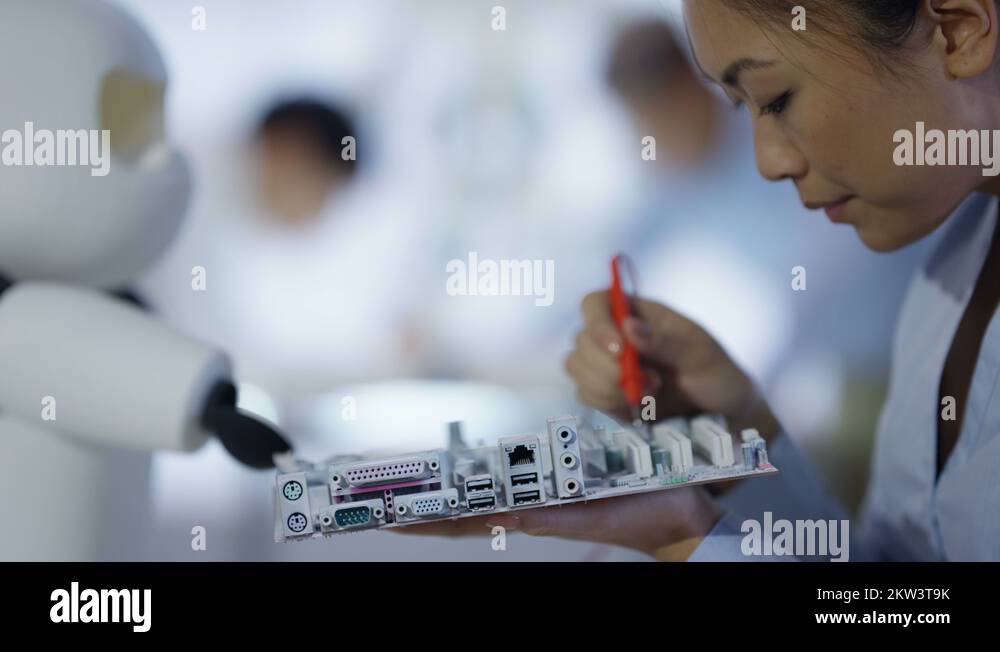 4K Technical design team working on construction of robot in modern lab ...