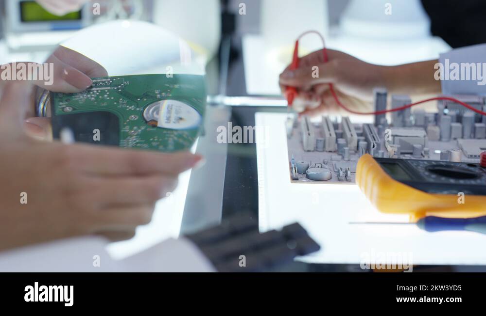 4K Technical design team collaborating on construction of robot in ...