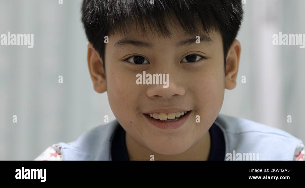 Asian child facial expressions Stock Video Footage - Alamy