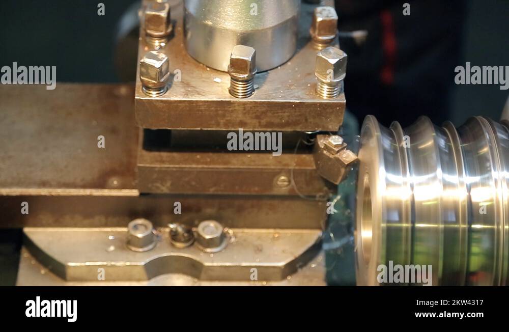 process of grindering parts out on lathe parts on factory Stock Video ...