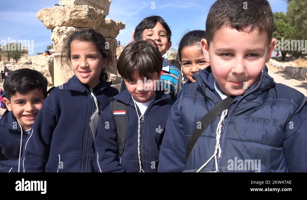 Curious school kids visit Citadel ruins in Amman, Jordan Middle East ...