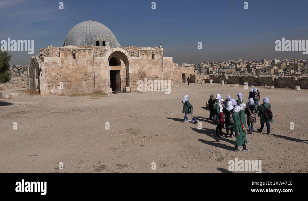 Veiled Muslim school girls visit palace of Citadel ruins in Amman ...