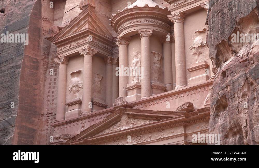 Carvings in the cliffside at the historic city of Petra in Jordan Stock ...