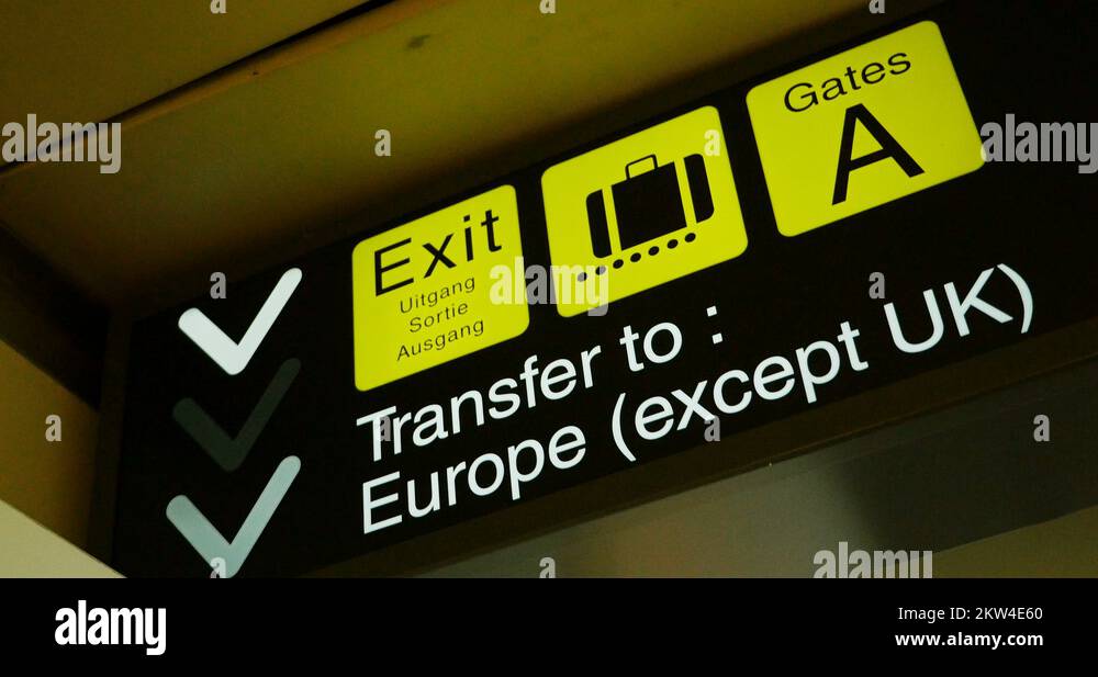 Exit sign and other airport sign in modern terminal pov Stock Video ...