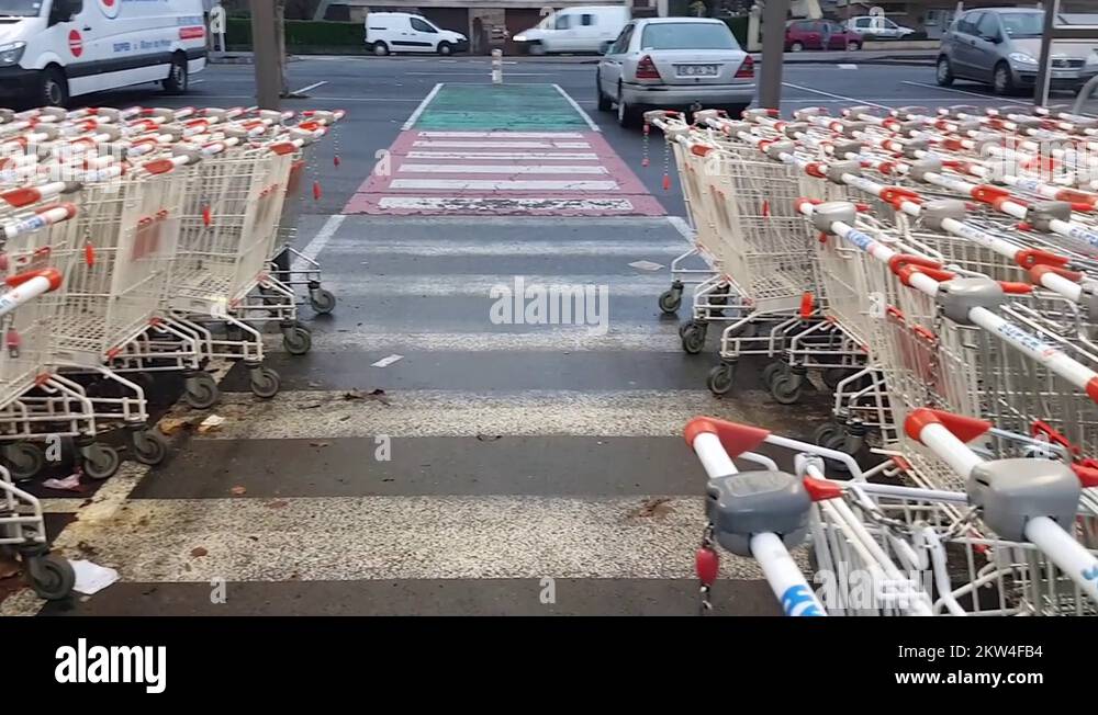 Shopping Carts On A Parking Lot Stock Video Footage - Alamy