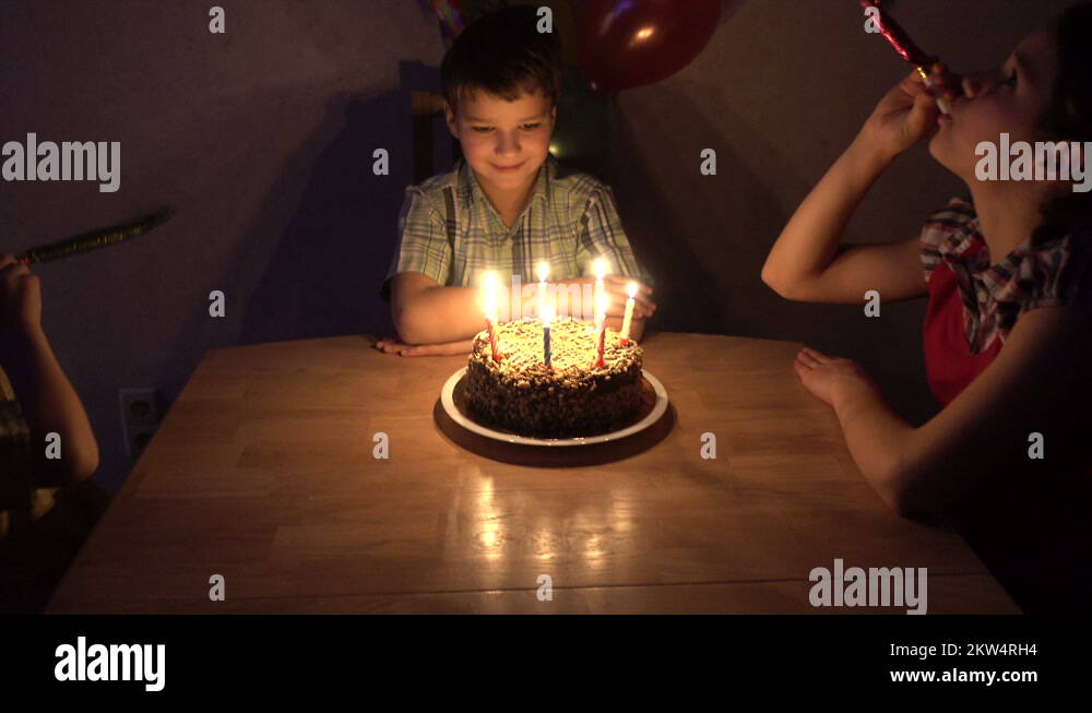 Boy celebrate his birthday with family Stock Video Footage - Alamy
