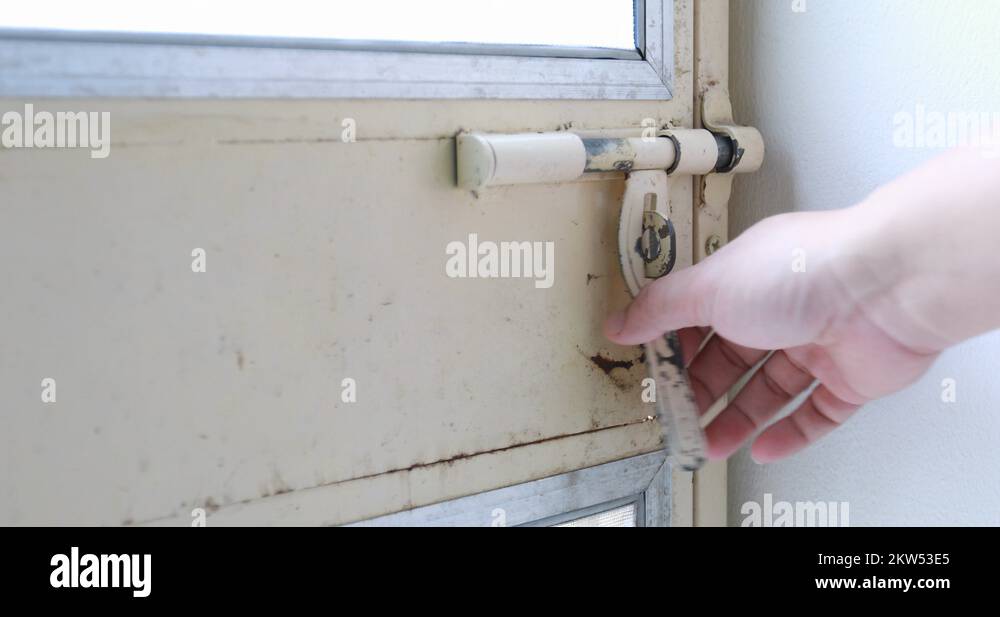 Man closing lock Stock Videos & Footage - HD and 4K Video Clips - Alamy