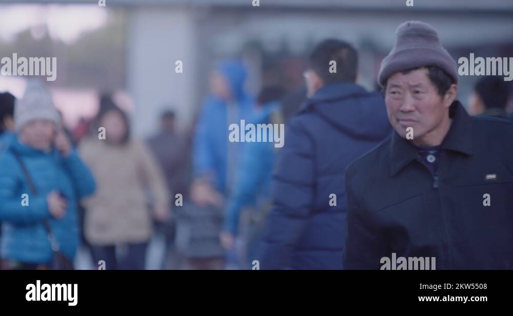 Chinese man walking, Beijing Stock Video Footage - Alamy