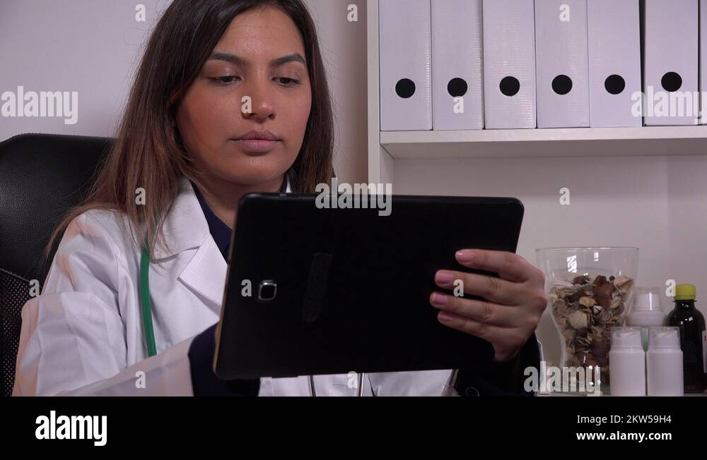 Attractive doctor practitioner Latina medical uniform stethoscope ...