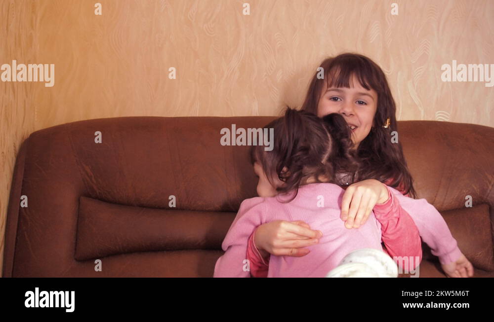 Sisters hug Stock Videos & Footage - HD and 4K Video Clips - Alamy