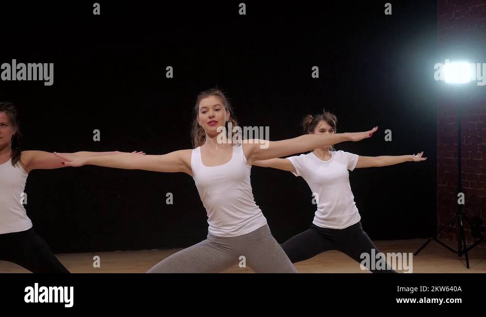 Young Girls Doing Yoga, Group of People In a Stretching Class, Healthy ...