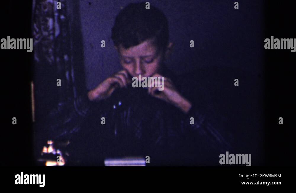 Boy playing harmonica Stock Videos & Footage - HD and 4K Video Clips ...