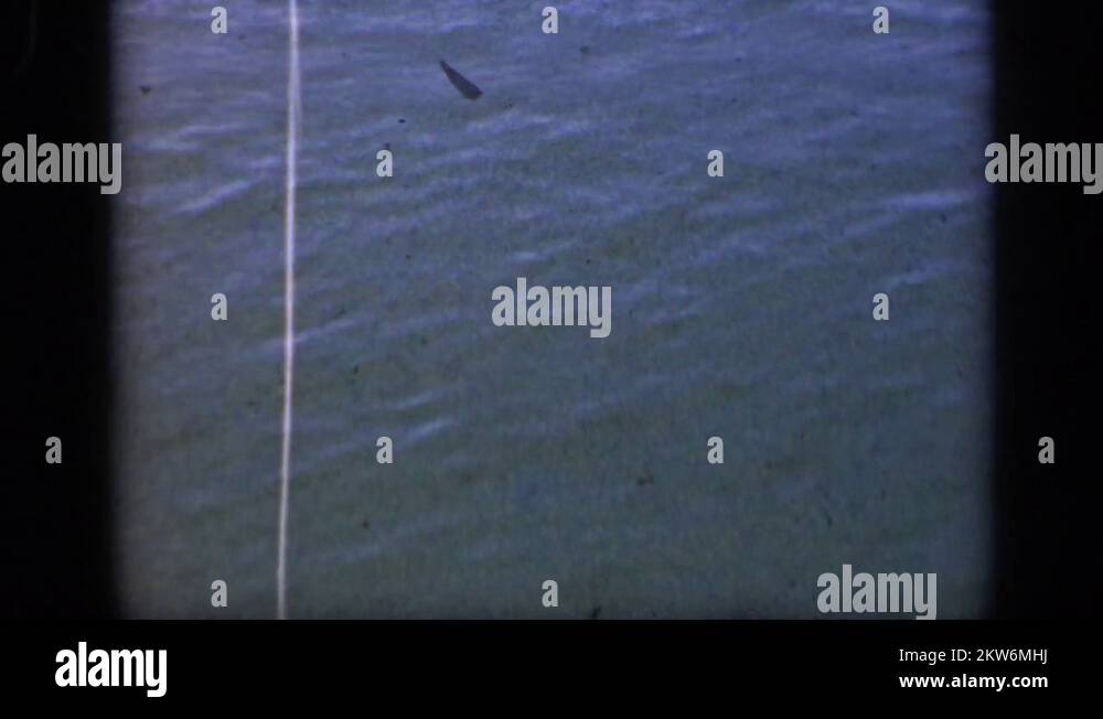 1948: someone puts long beautiful object in water from moving vessel ...