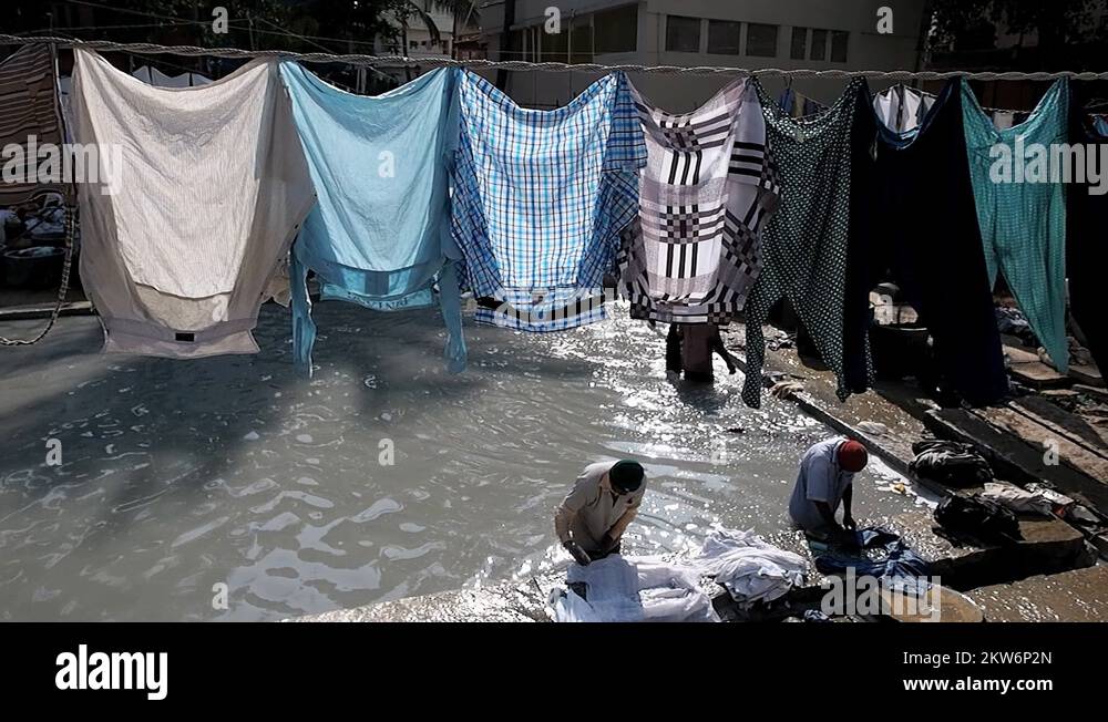 Dhobi washermen washing clothes in Dhobi Ghat in Bangalore, Karnataka ...