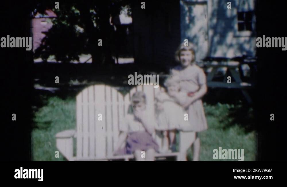 1961: the girl standing, another girl sitting Stock Video Footage - Alamy