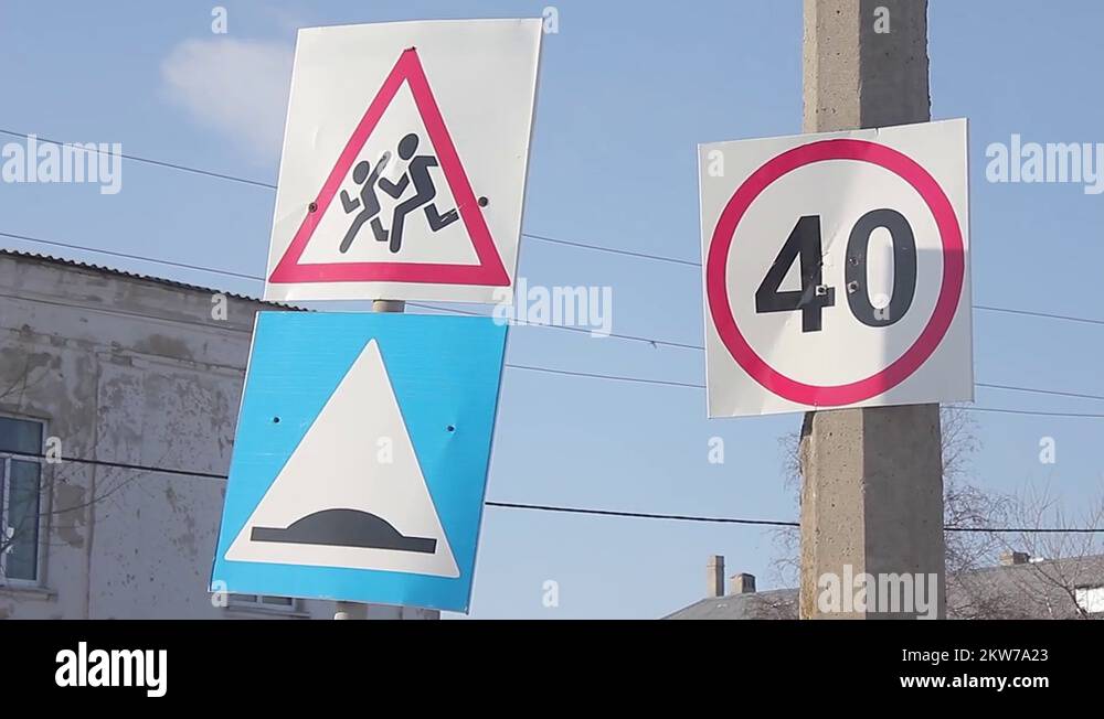 Wet road sign Stock Videos & Footage - HD and 4K Video Clips - Alamy