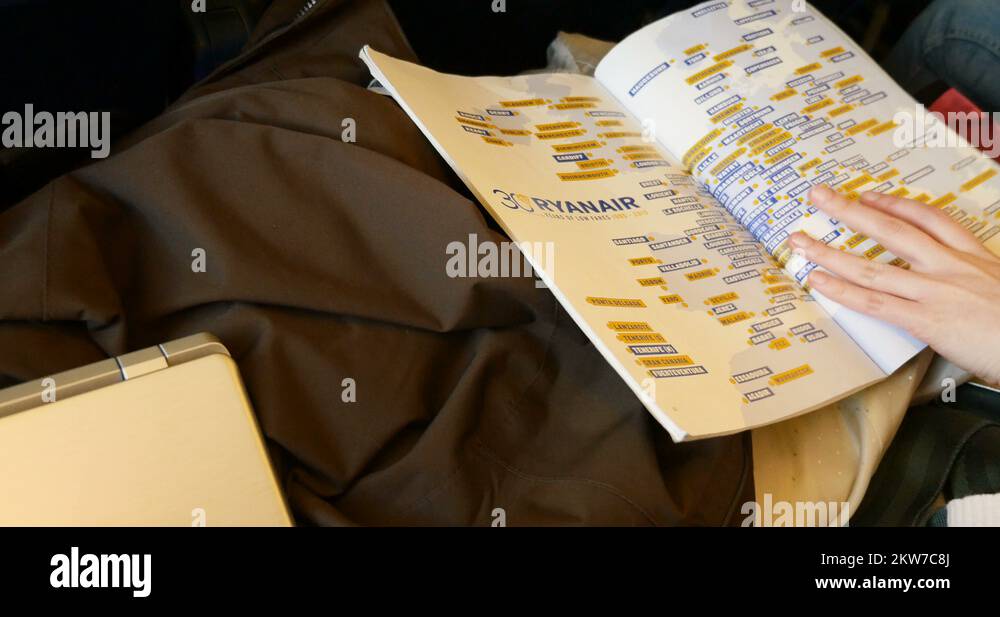 Reading about the Ryanair flight maps Inflight magazine Stock Video ...